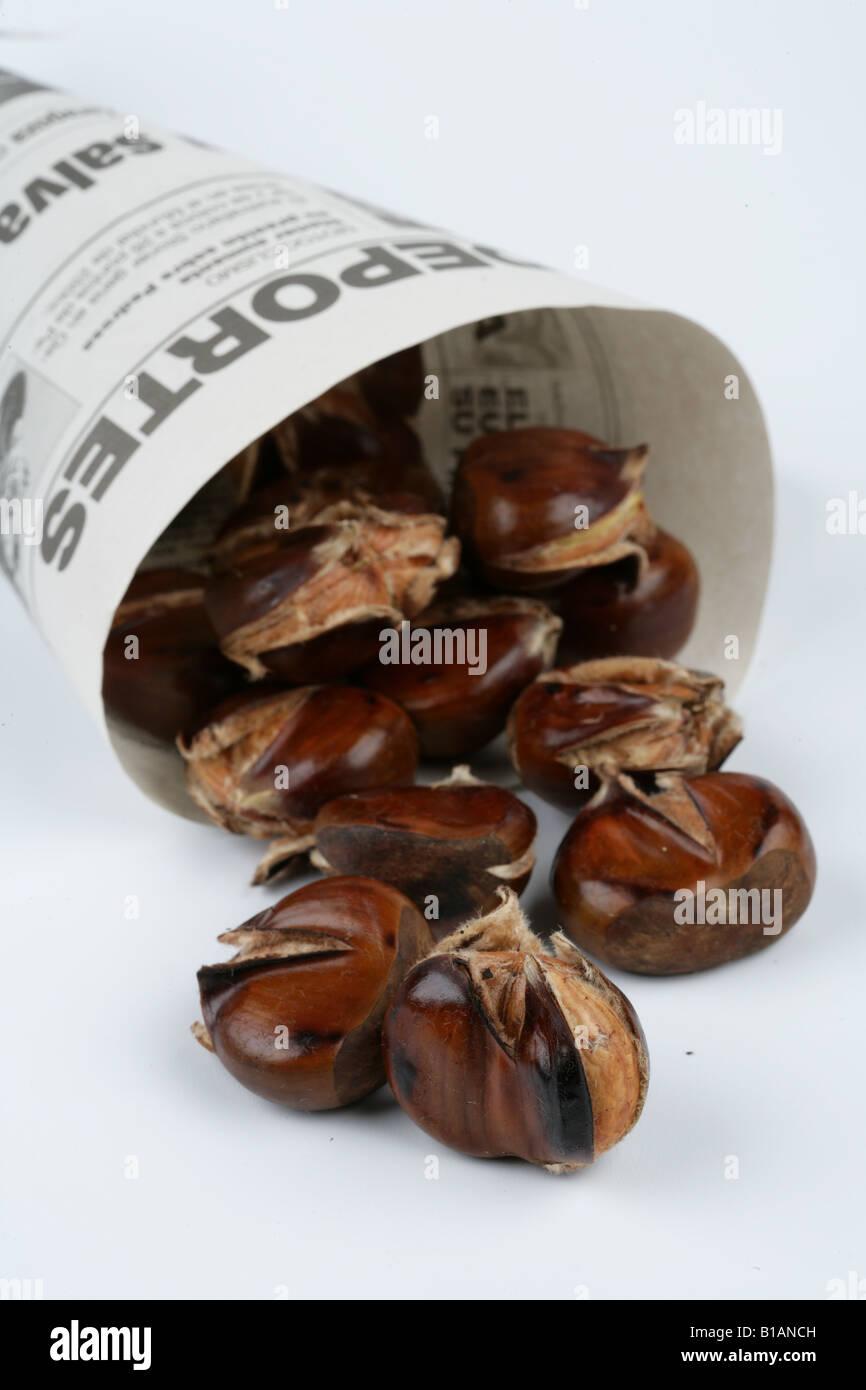 Roasted chestnuts in a newspaper cone Stock Photo - Alamy