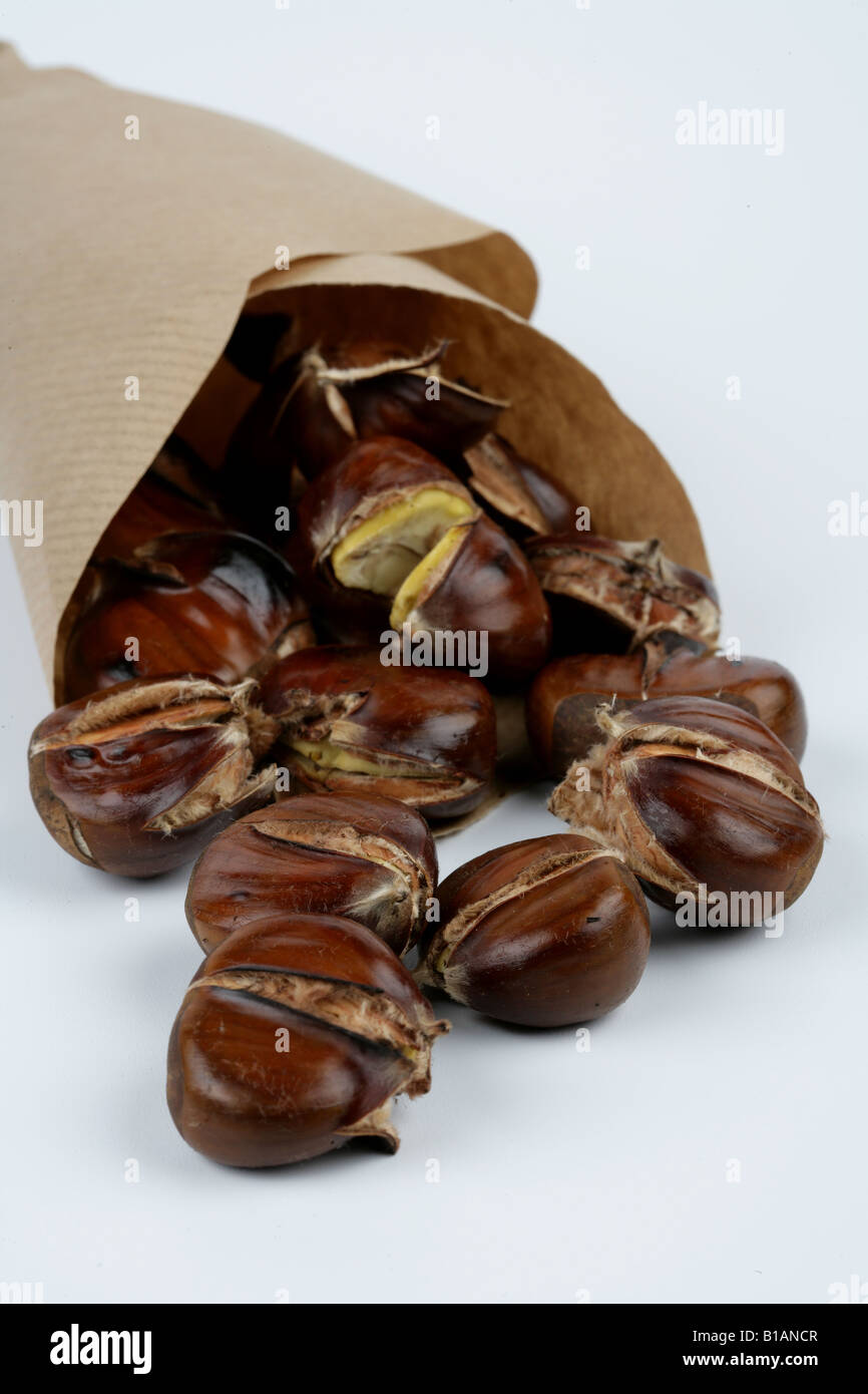 Roasted chestnuts in a paper cone Stock Photo - Alamy