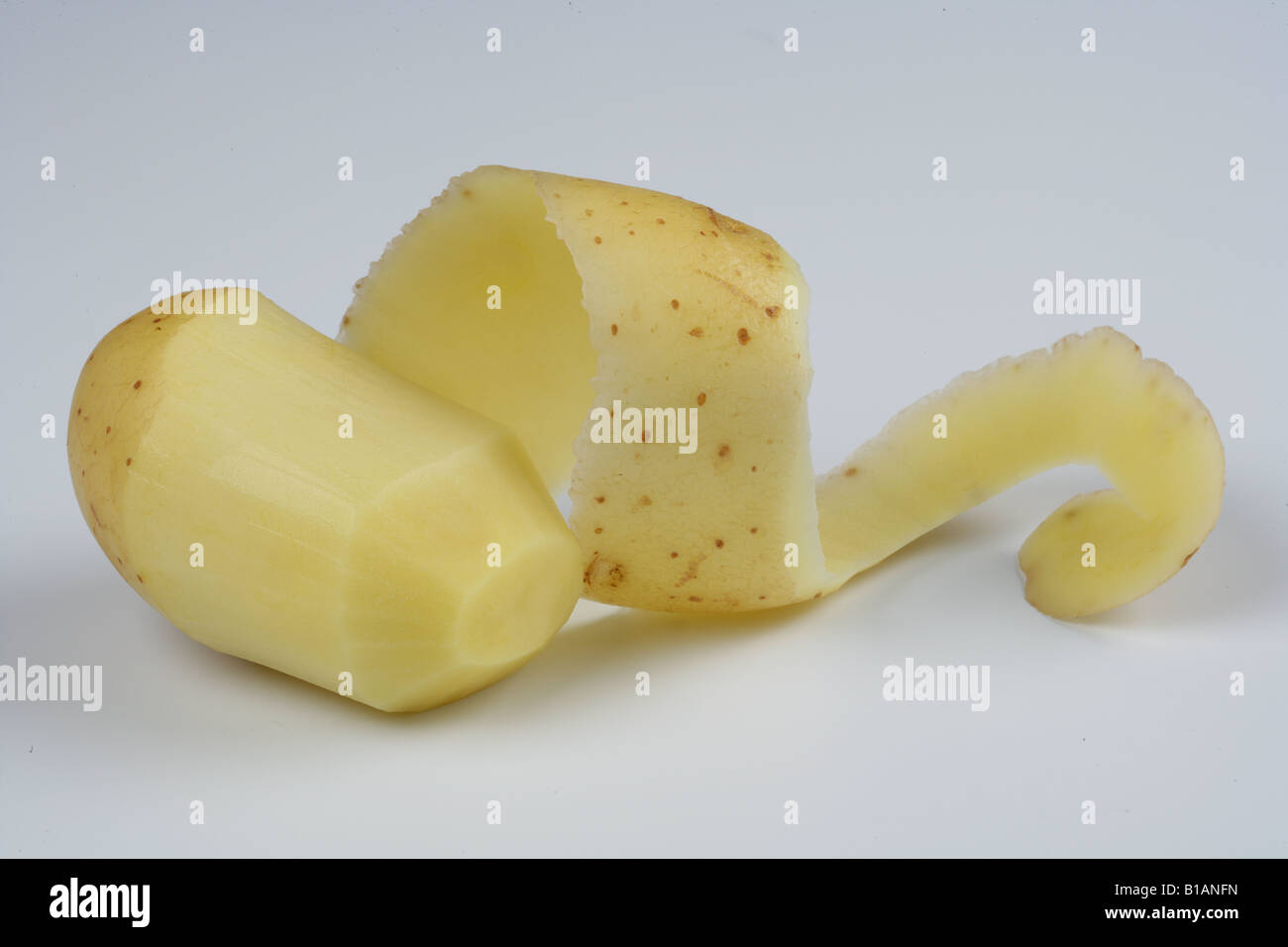 Half peeled potato hi-res stock photography and images - Alamy