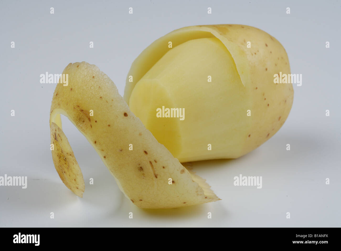 Half peeled potato hi-res stock photography and images - Alamy