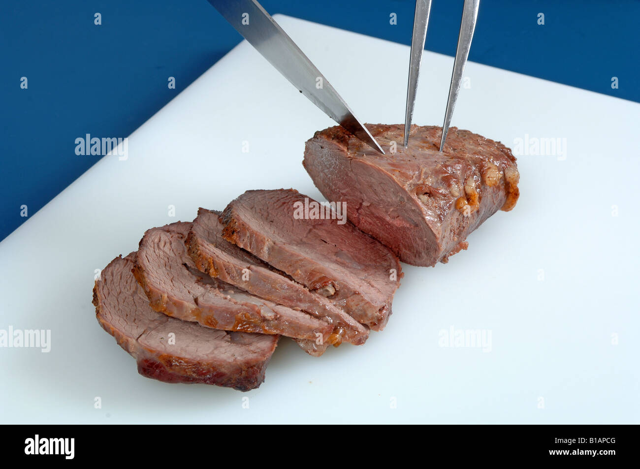Making beef fillets to serve Stock Photo - Alamy