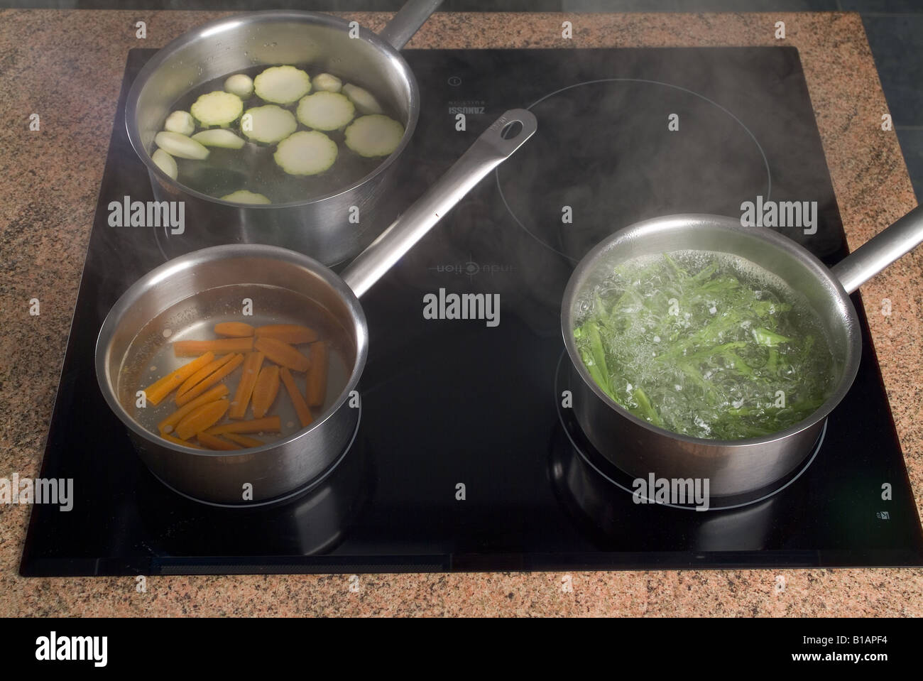 Cooking vegetables separately Stock Photo - Alamy
