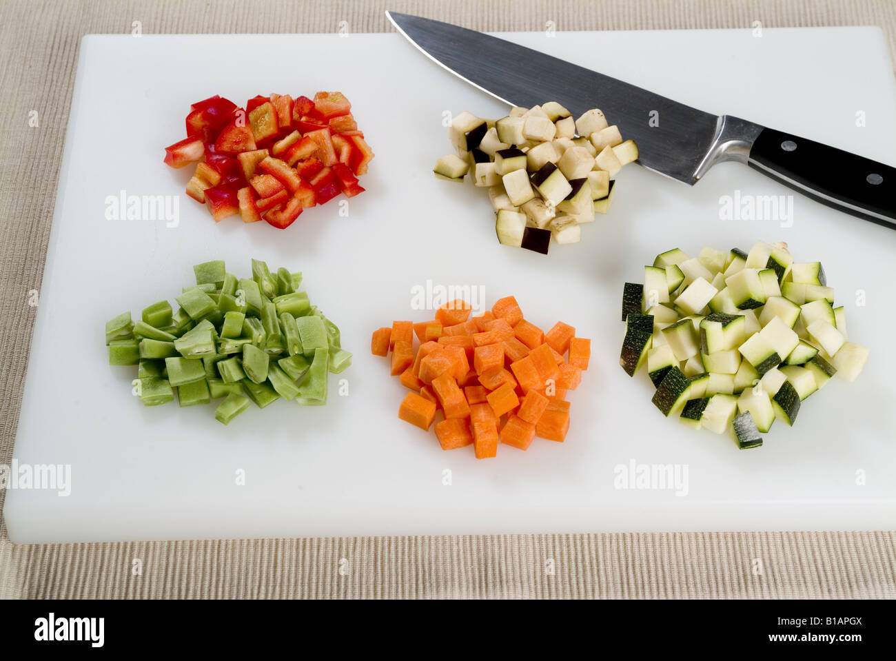 Vegetables chopped into cubes Stock Photo - Alamy
