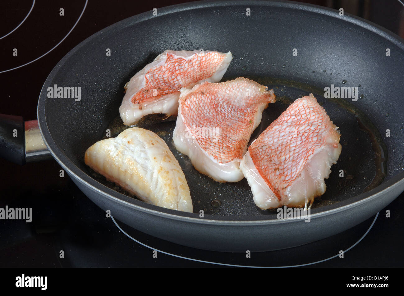 Making grilled scorpion fish Stock Photo - Alamy