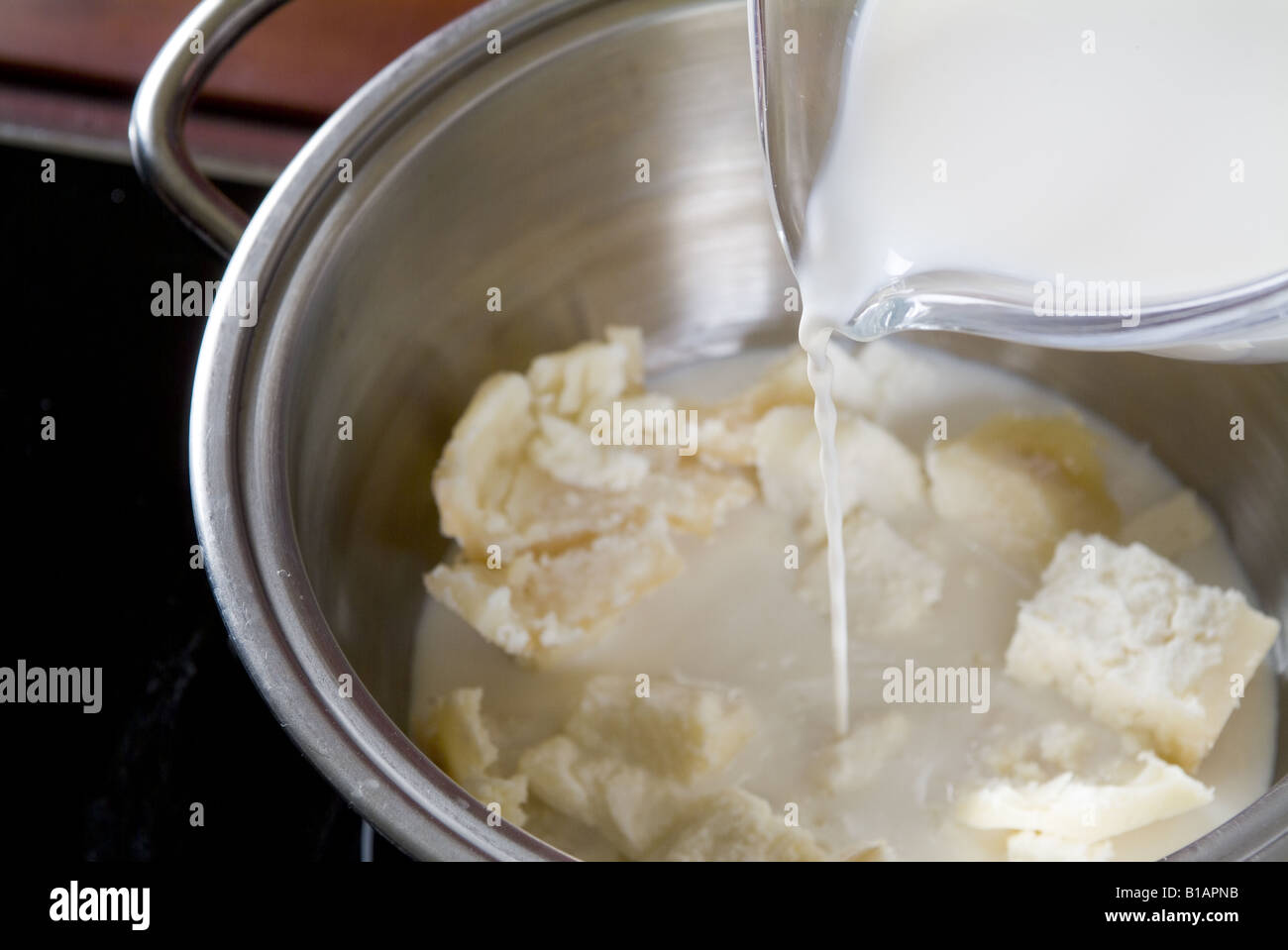 Making cream of goat cheese Stock Photo - Alamy