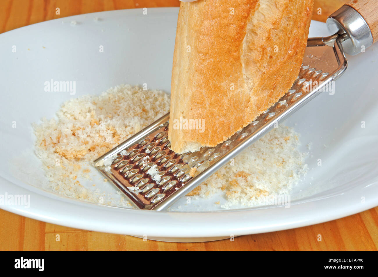 Grating bread hi-res stock photography and images - Alamy