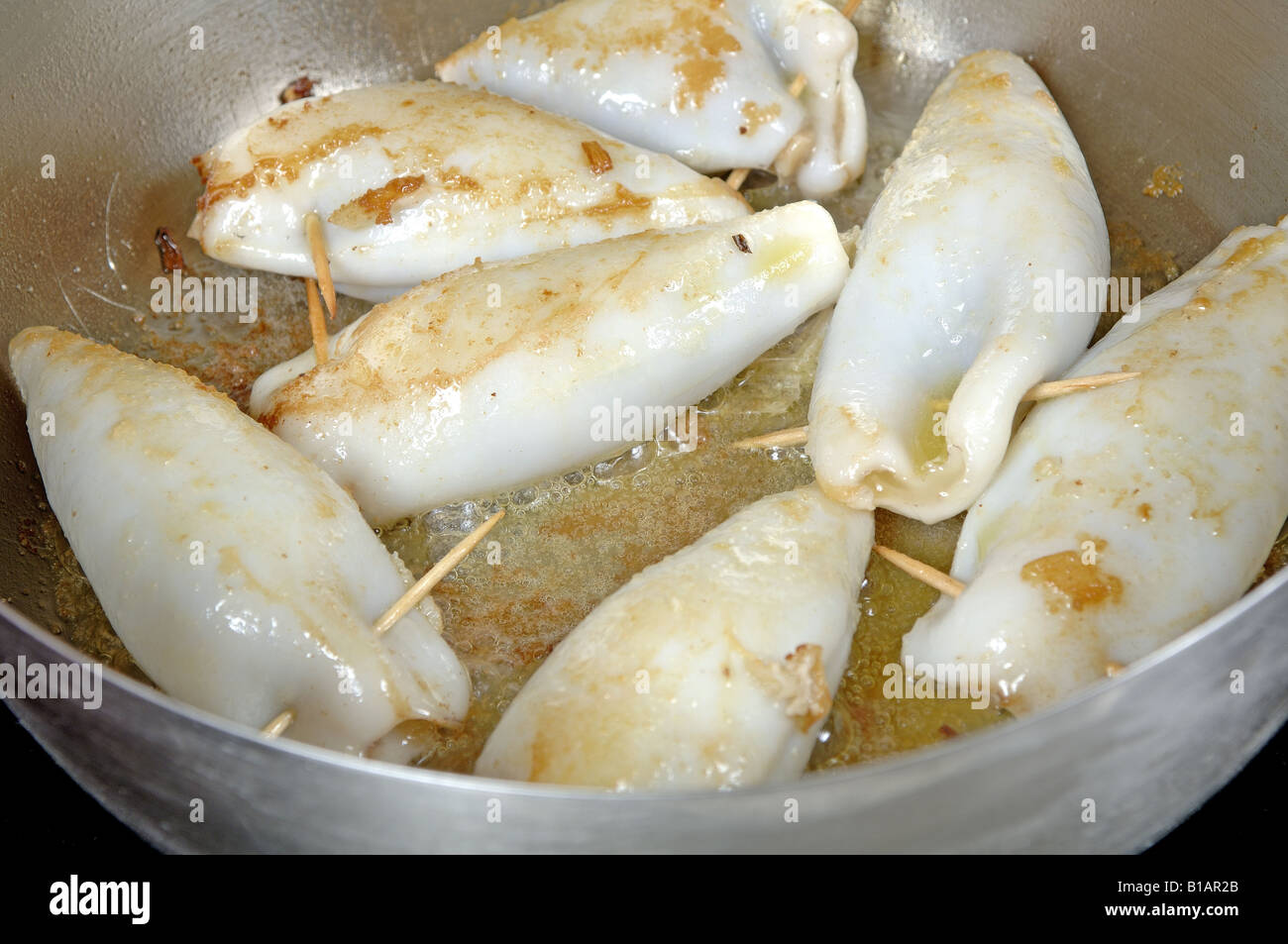 Step 3 Stuffed baby squid Stock Photo - Alamy