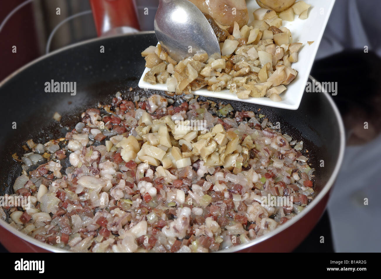 Step 1 Stuffed baby squid Stock Photo - Alamy