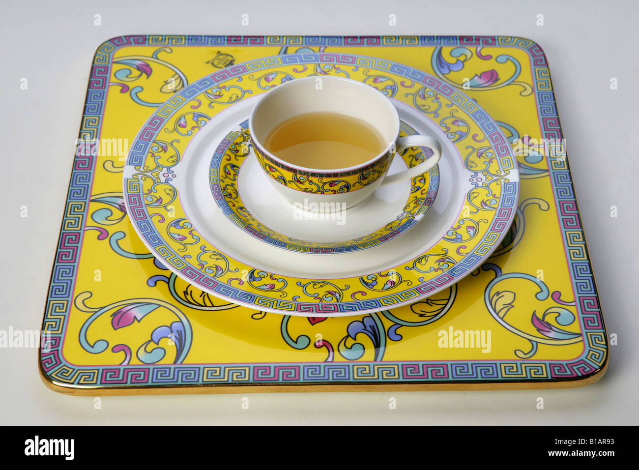 teacup and stack of dishes Stock Photo - Alamy