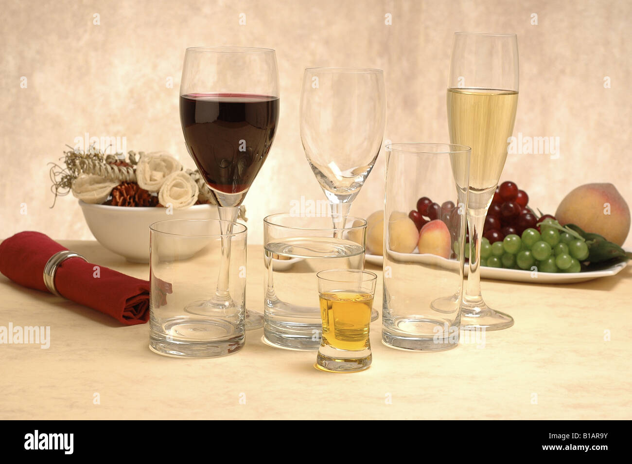 Still-life of glasses and glass bottles Stock Photo - Alamy