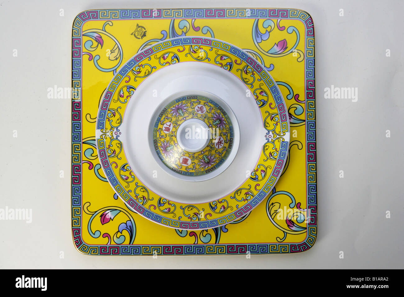 teacup and stack of dishes Stock Photo - Alamy