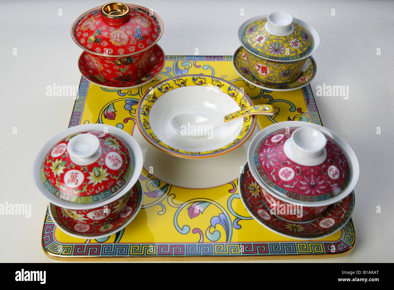 teacup and stack of dishes Stock Photo - Alamy