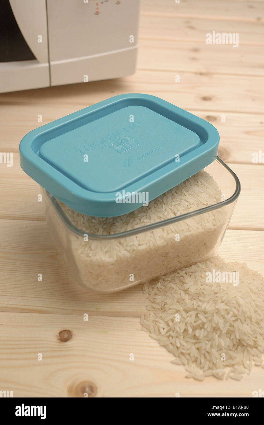 Glass lunch box with large-grain rice Stock Photo - Alamy