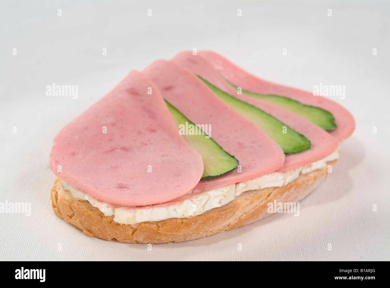 Toast with cheese and cold meat Stock Photo - Alamy
