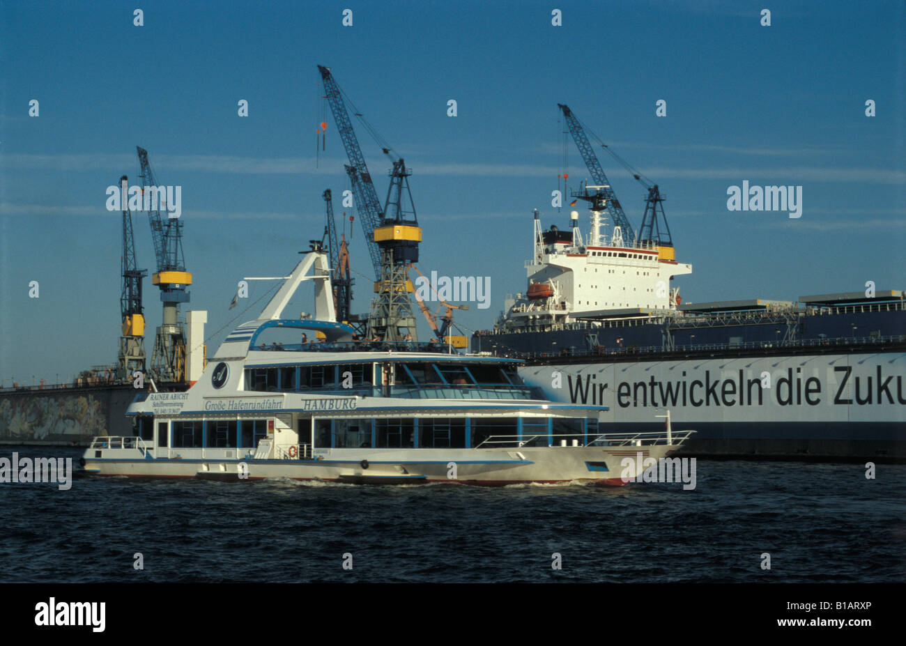 Harbour excursion on cruise boat in the port of Hamburg, Germany Stock ...