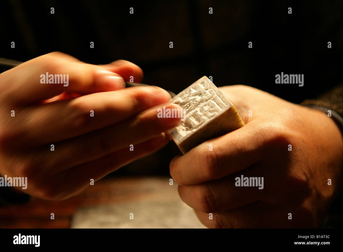 China,man's hands carving traditional chop,close-up Stock Photo - Alamy