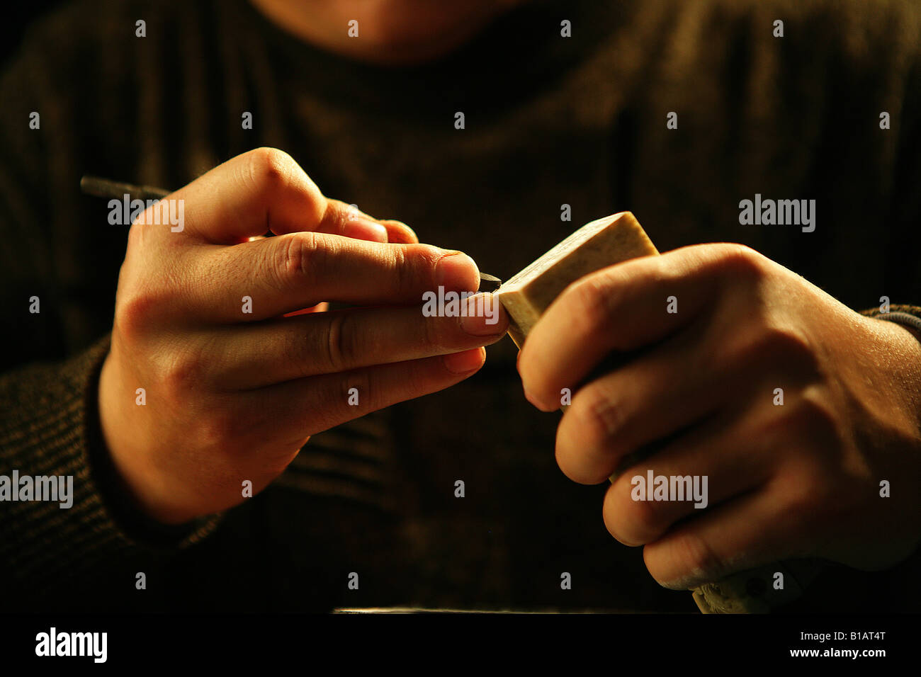China,man's hands carving traditional chop,close-up Stock Photo - Alamy