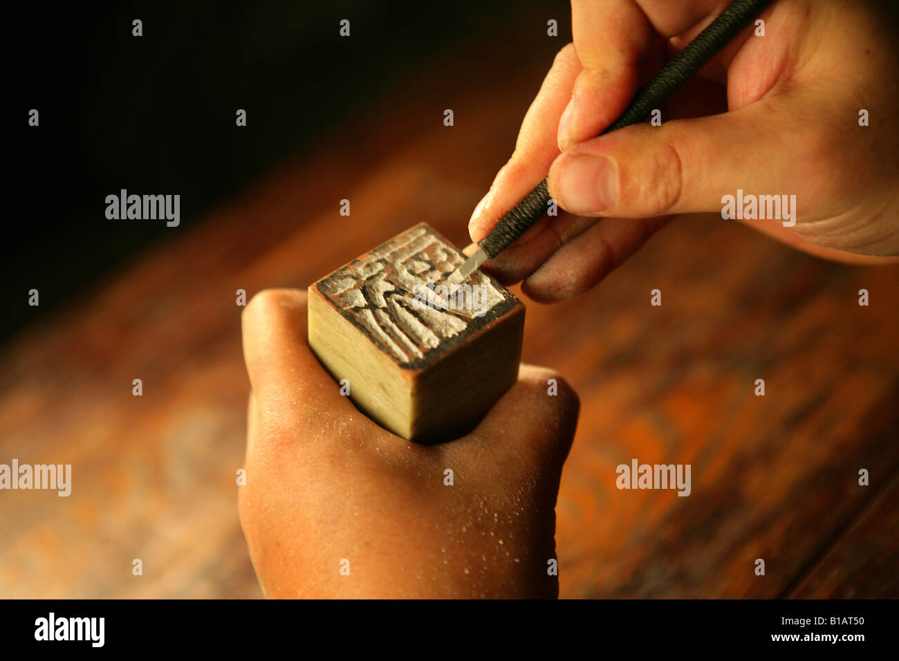 China,man's hands carving traditional chop,close-up Stock Photo - Alamy