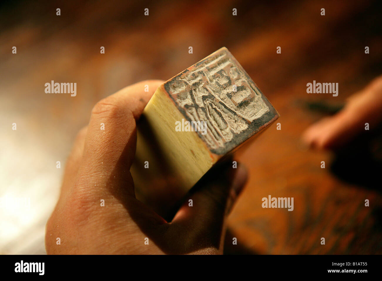 China,man's hands carving traditional chop,close-up Stock Photo - Alamy