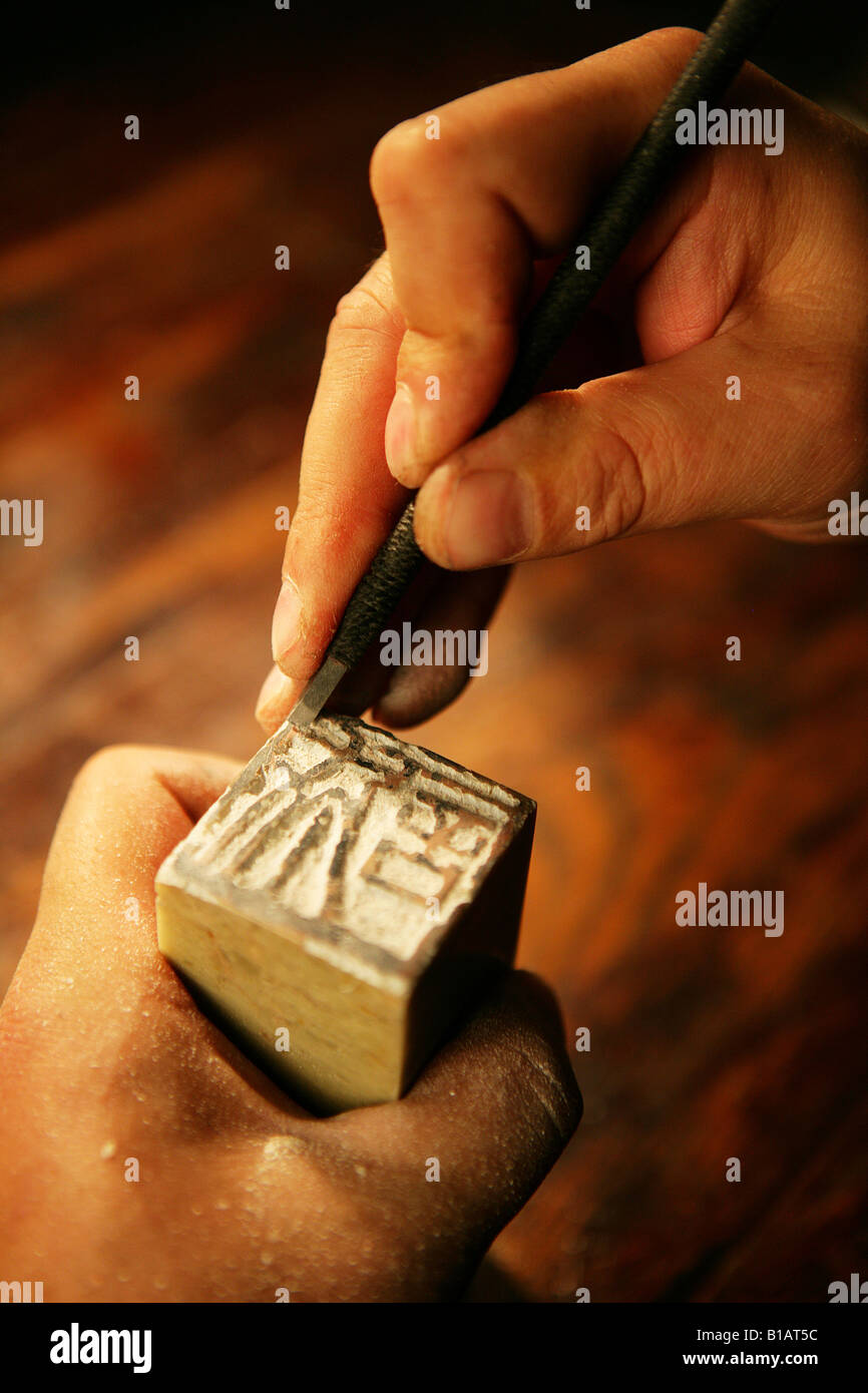 China,man's hands carving traditional chop,close-up Stock Photo - Alamy