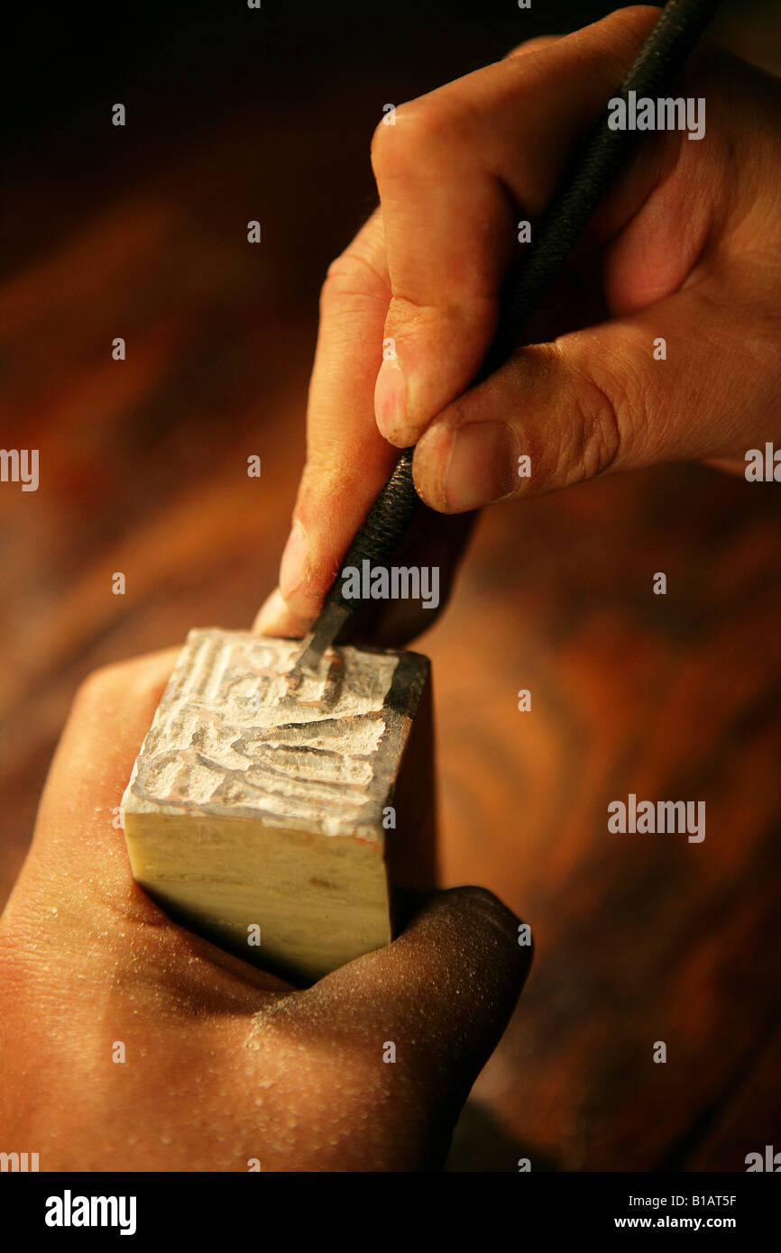 China,man's hands carving traditional chop,close-up Stock Photo - Alamy