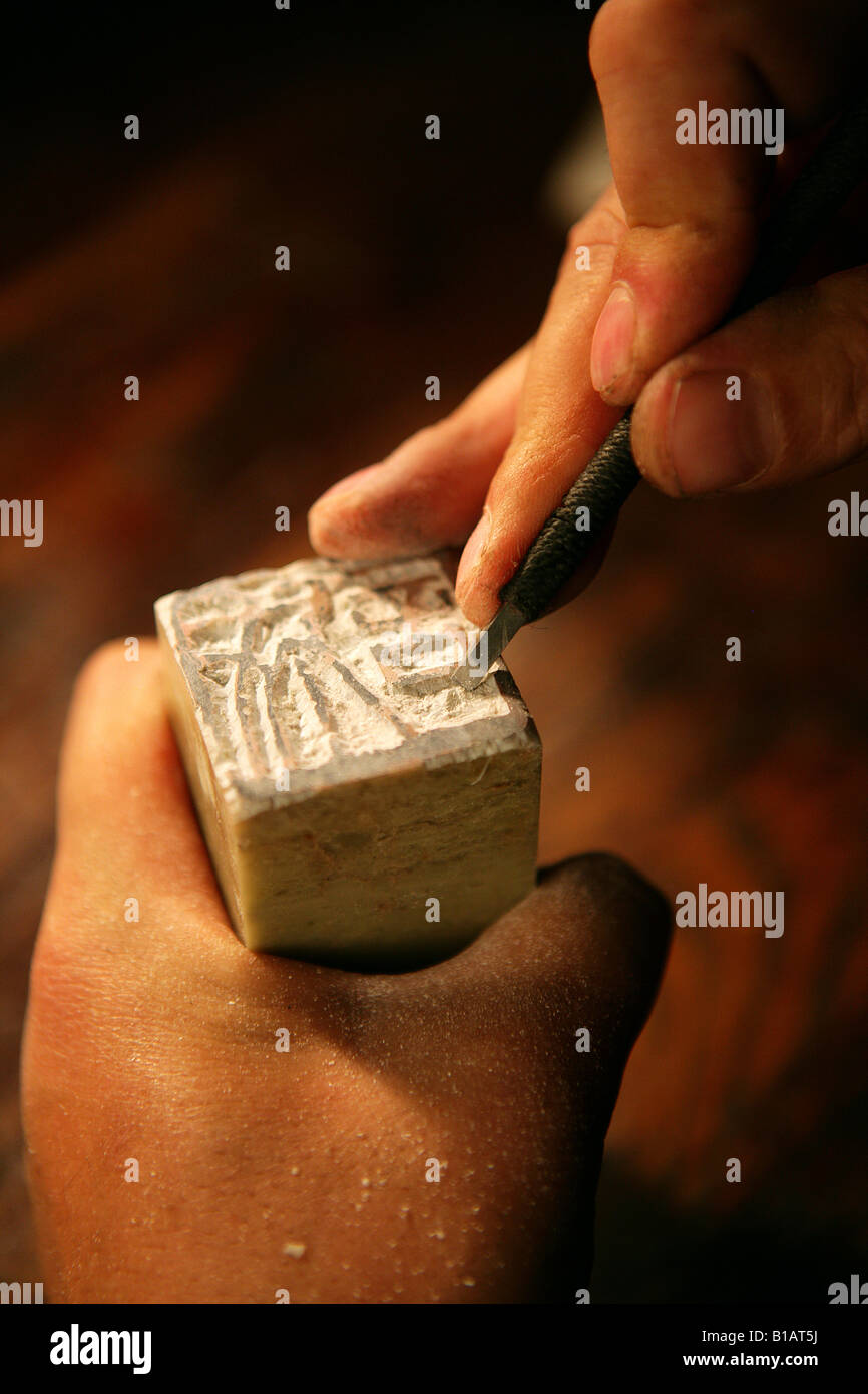 China,man's hands carving traditional chop,close-up Stock Photo - Alamy