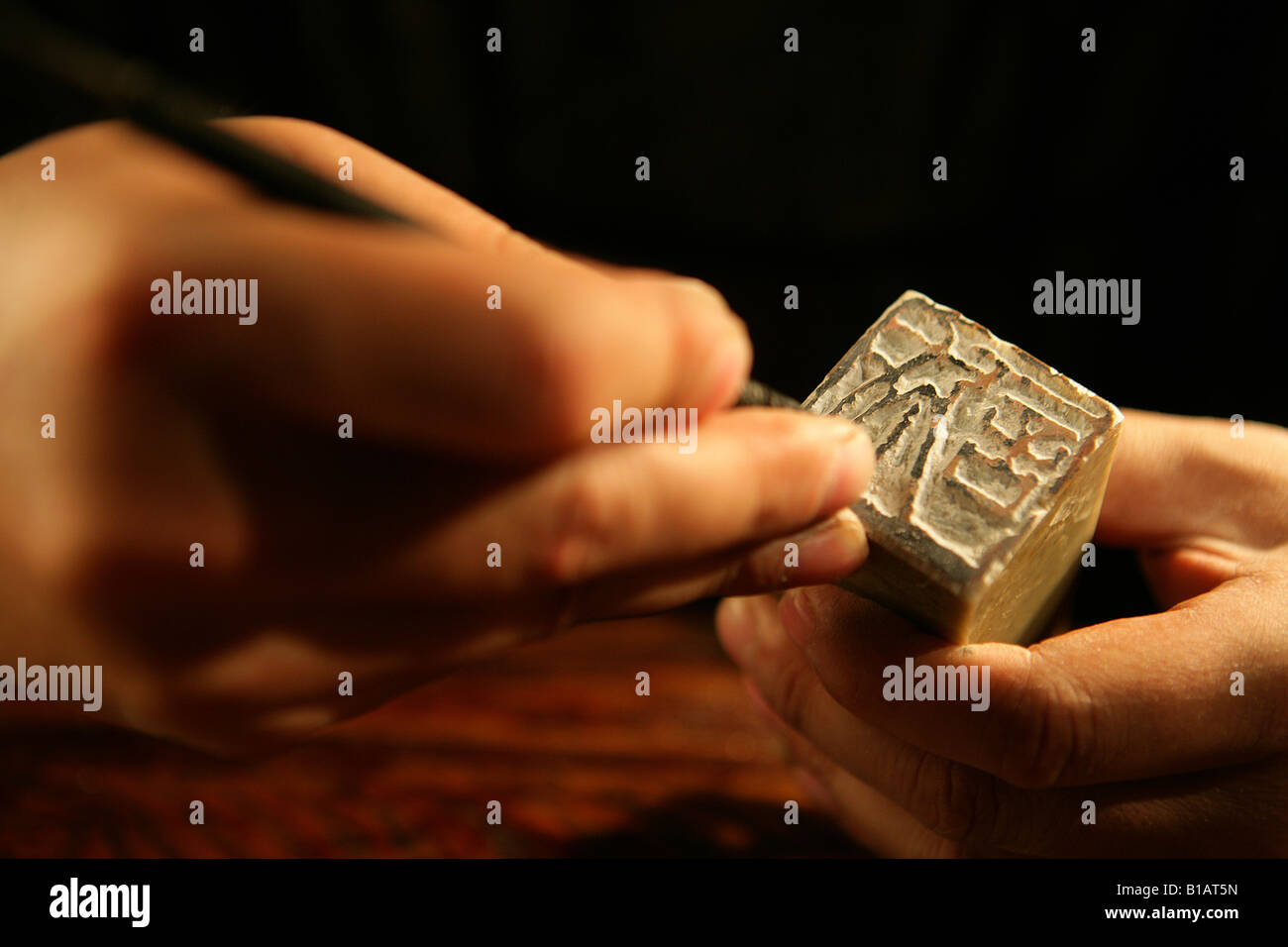 China,man's hands carving traditional chop,close-up Stock Photo - Alamy