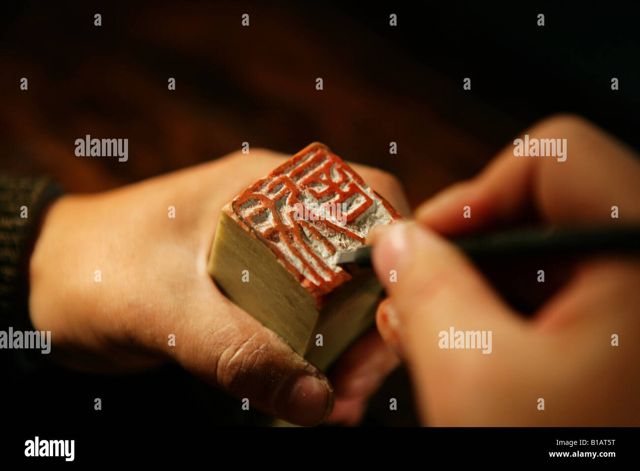 China,man's hands carving traditional chop,close-up Stock Photo - Alamy