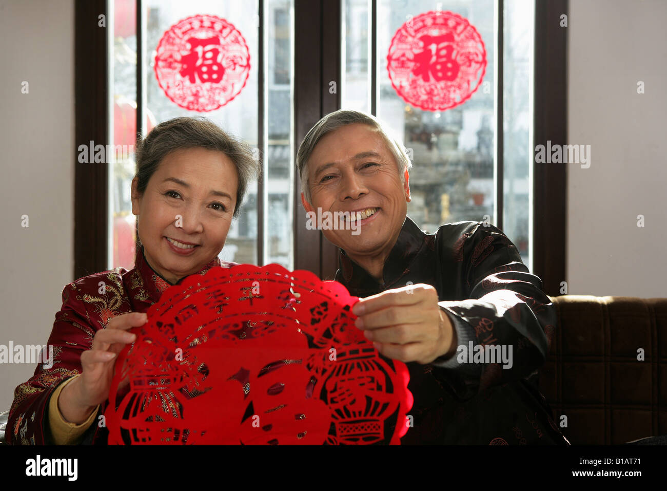Couple men holding glass Cut Out Stock Images & Pictures - Alamy