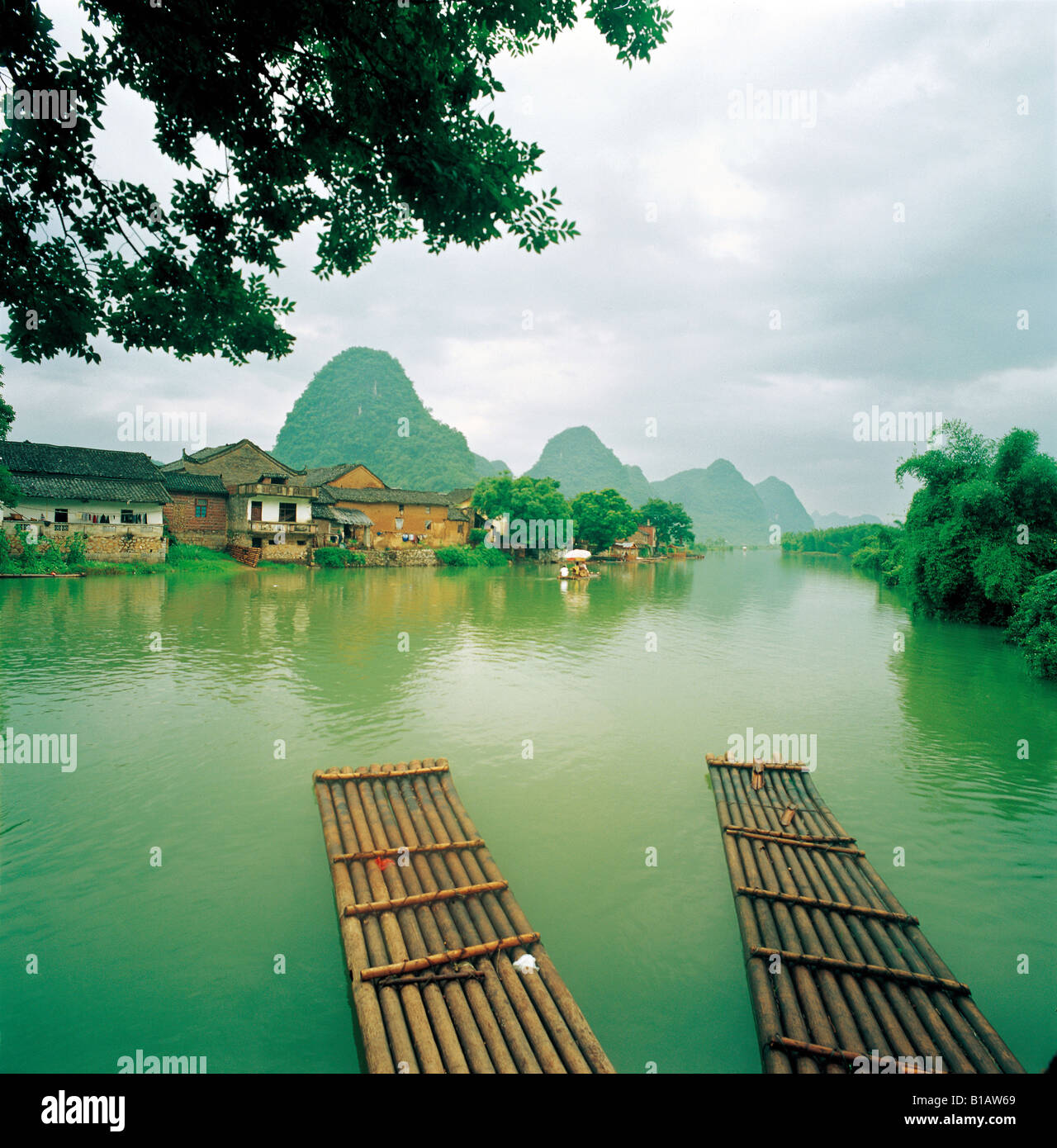 rafts in river passing village,Guilin,Guangxi,China Stock Photo - Alamy