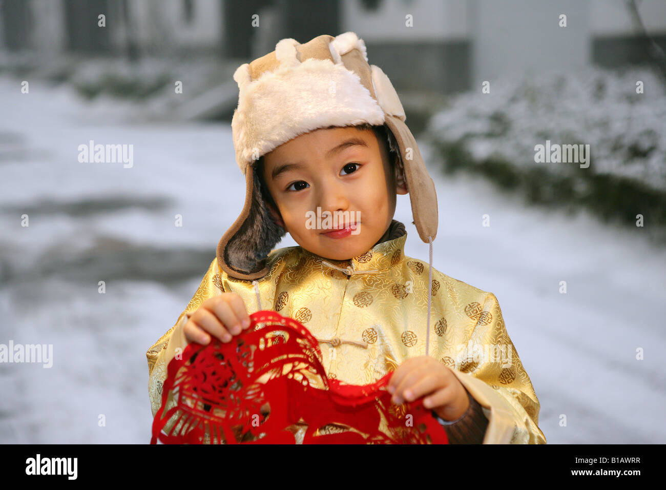 Smiling boy china Cut Out Stock Images & Pictures - Alamy