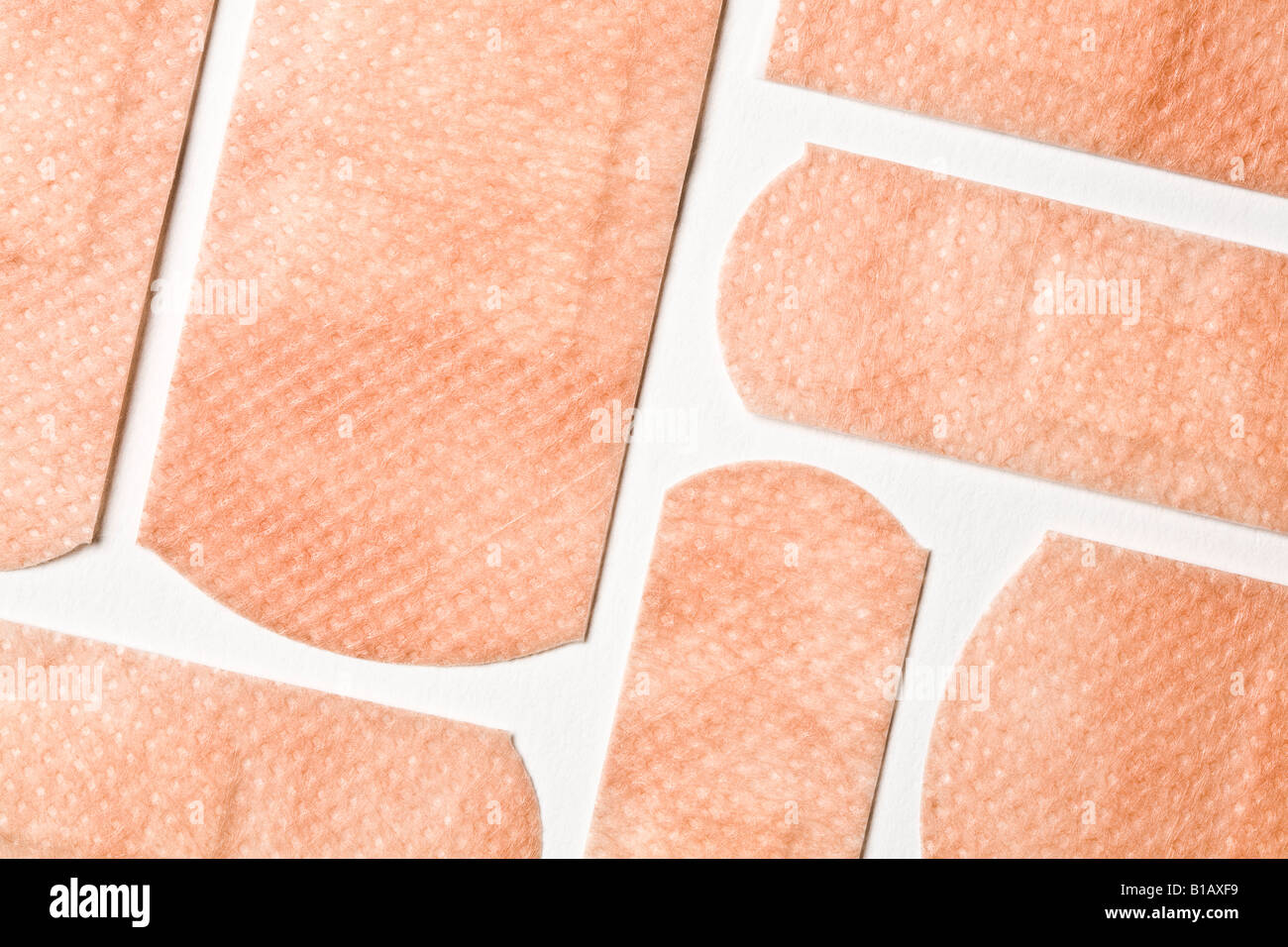 An assortment of skin colored sticking plasters Stock Photo - Alamy
