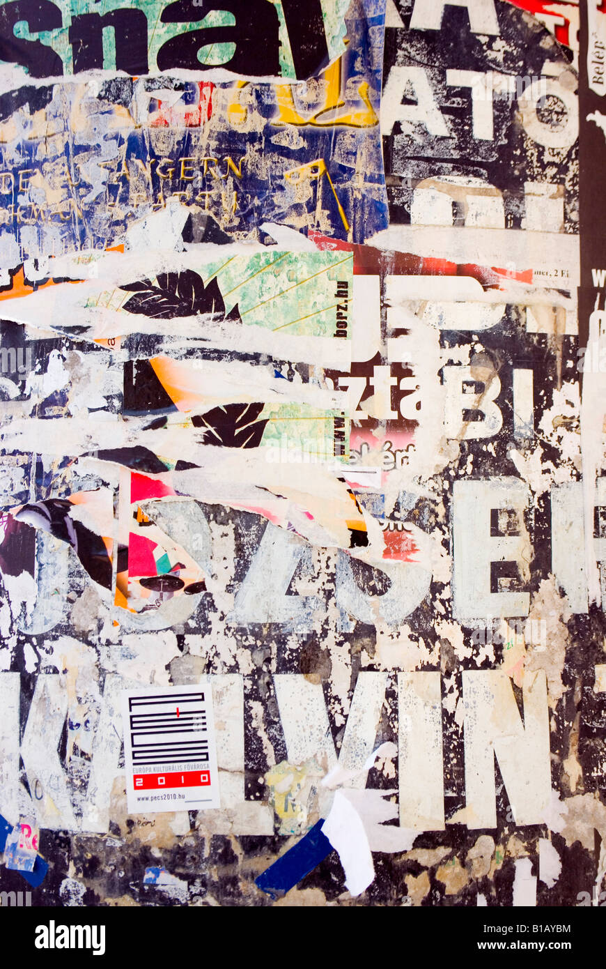Torn posters on wall, full frame Stock Photo - Alamy