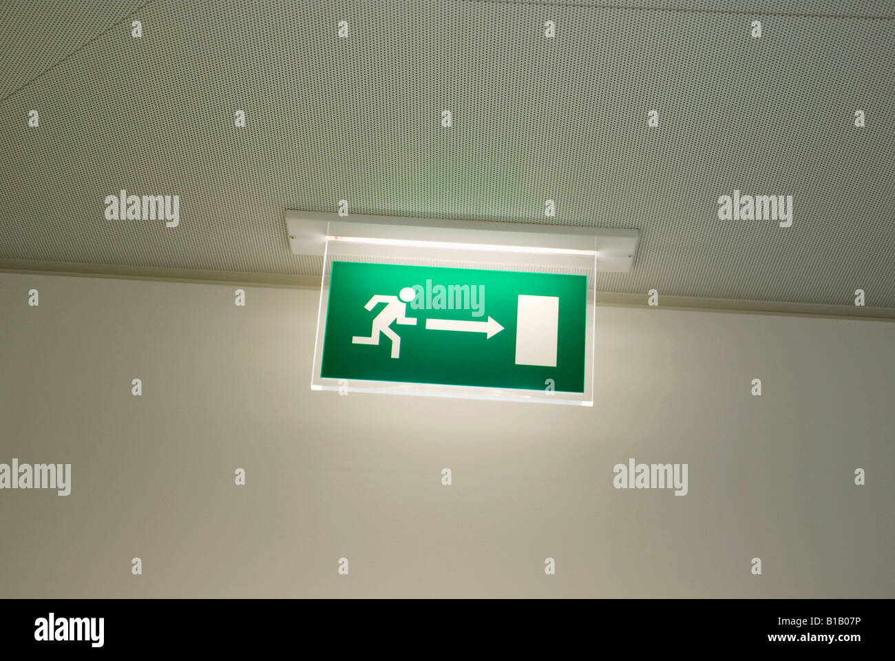 Emergency exit sign Stock Photo - Alamy