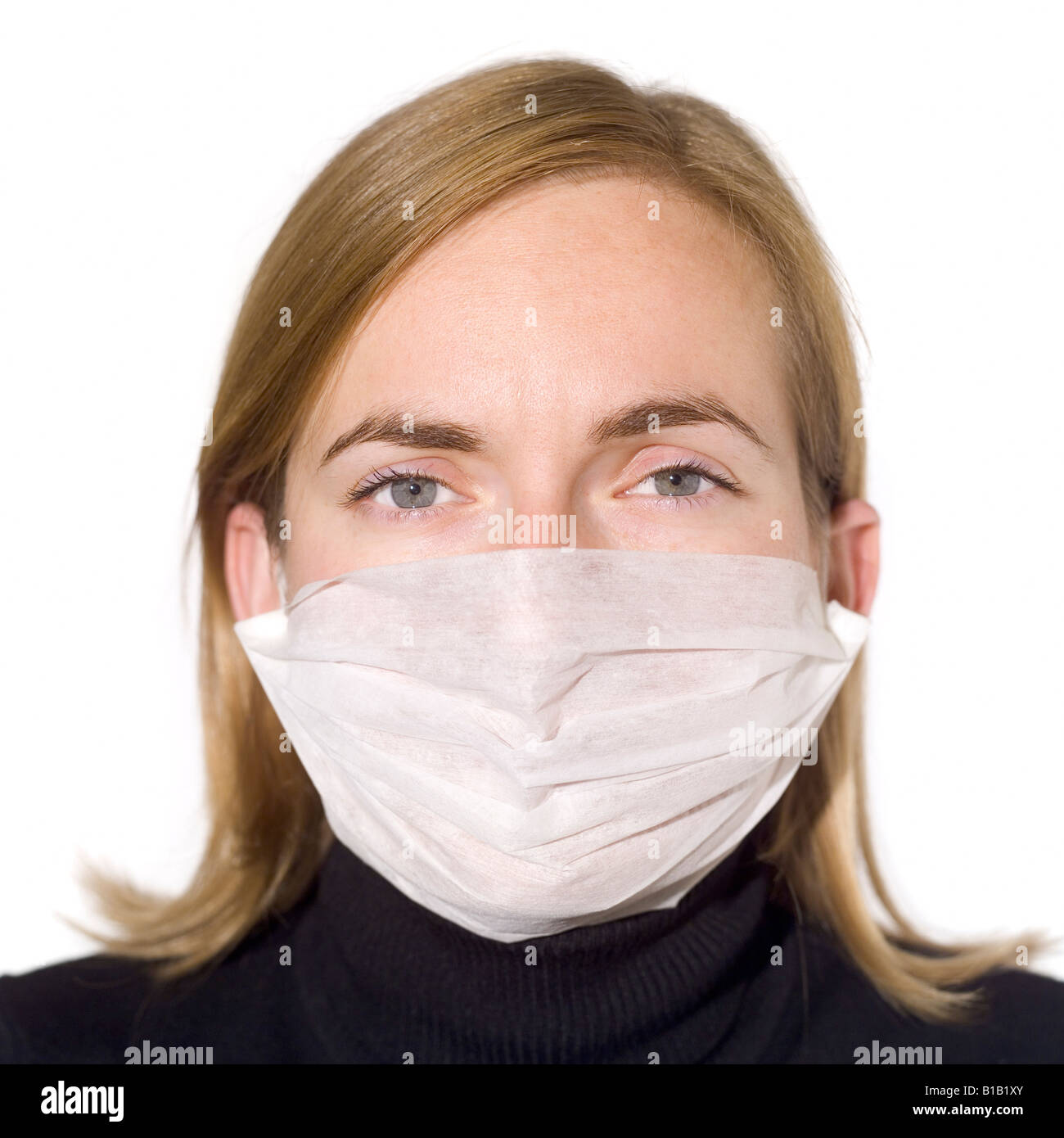 Young woman wearing a mask, portrait Stock Photo - Alamy