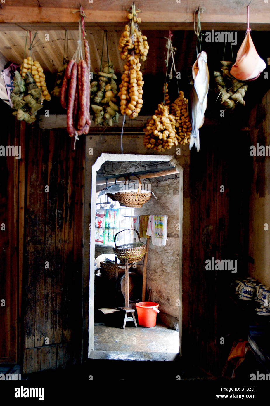 dried food hanging on civilian house's door Stock Photo - Alamy
