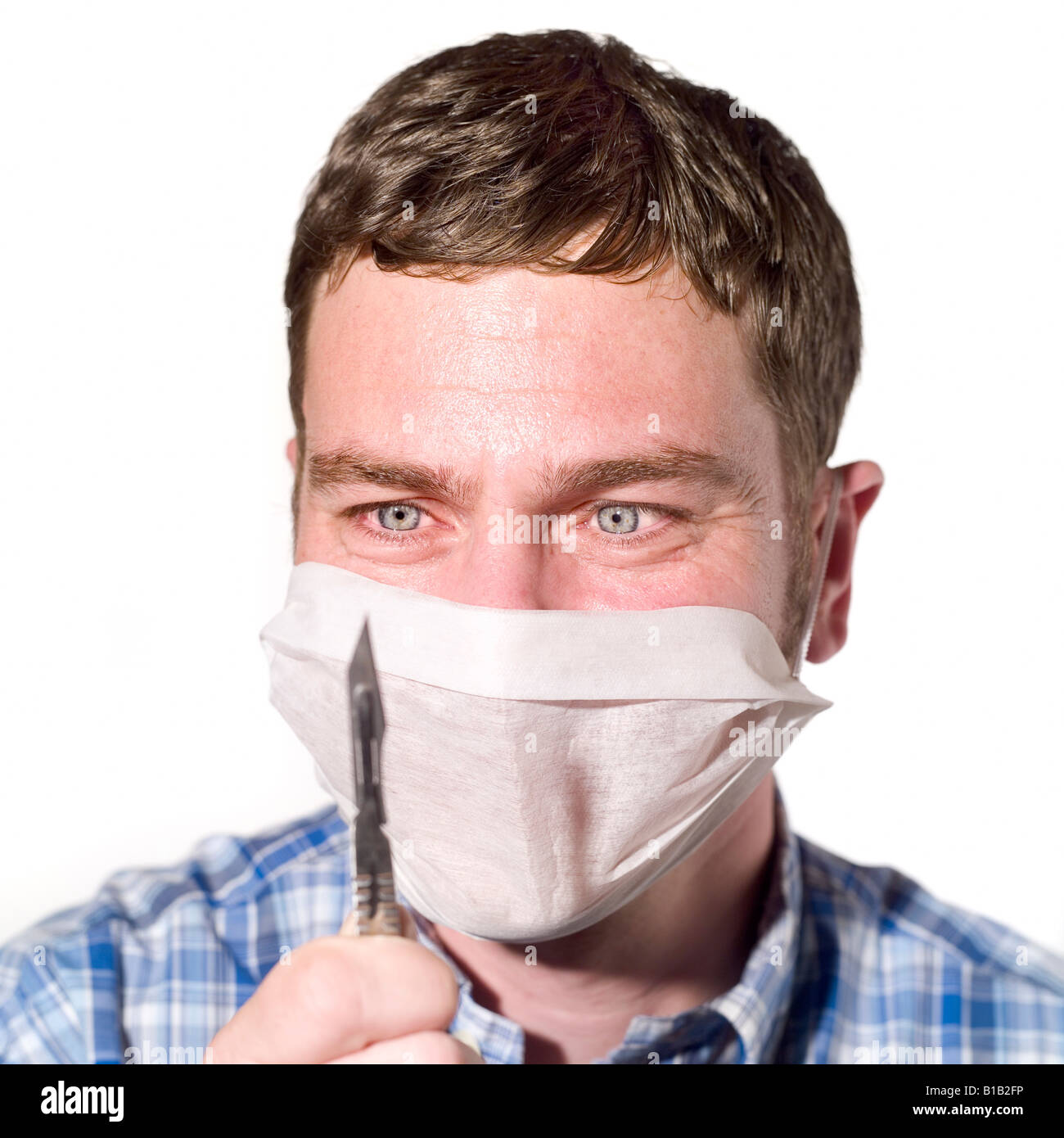 Man wearing a mask, portrait Stock Photo - Alamy