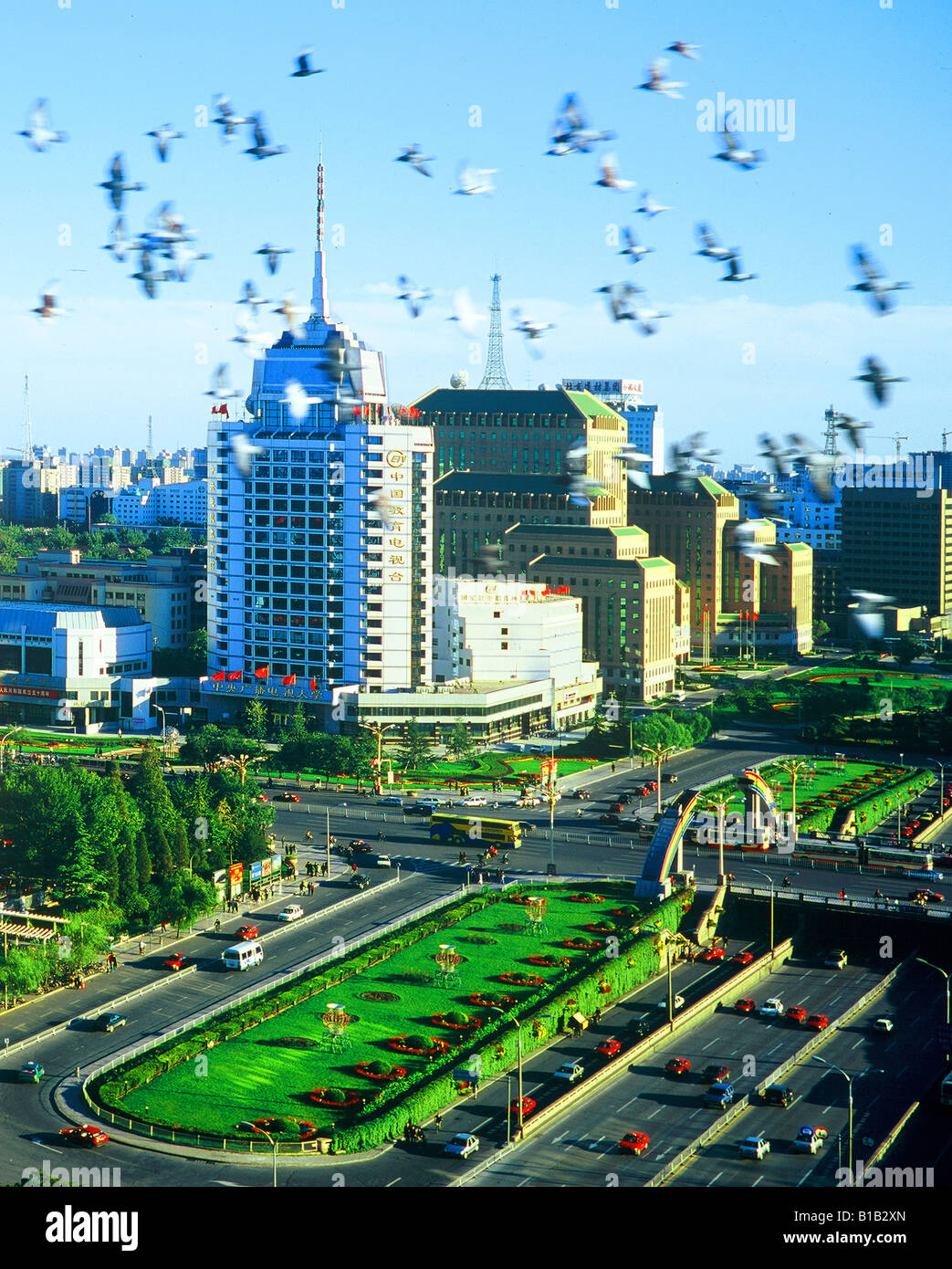 pigeons flying over Fuxingmen,Beijing,China Stock Photo - Alamy