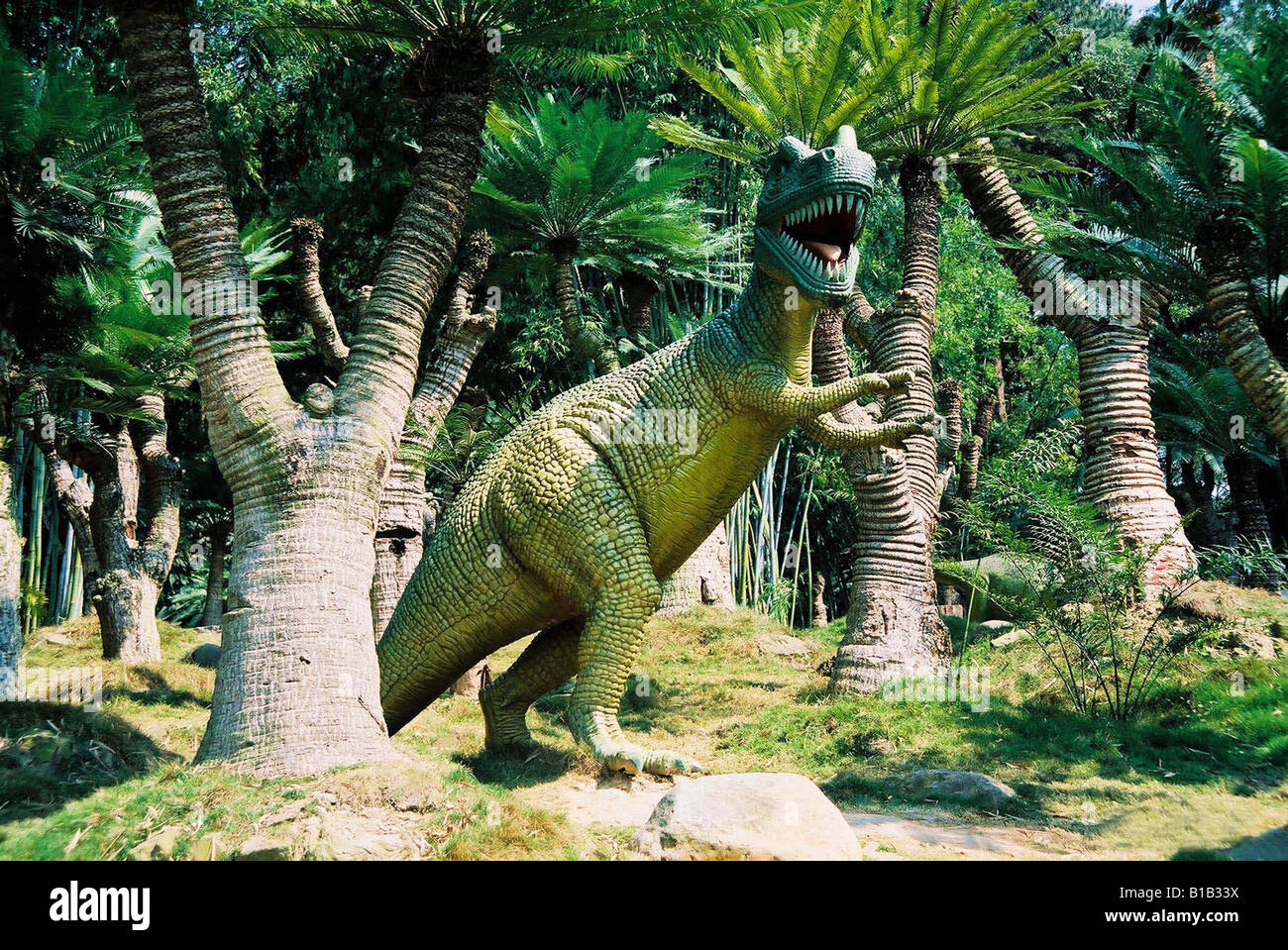 dinosaur in tropical rainforest Stock Photo - Alamy