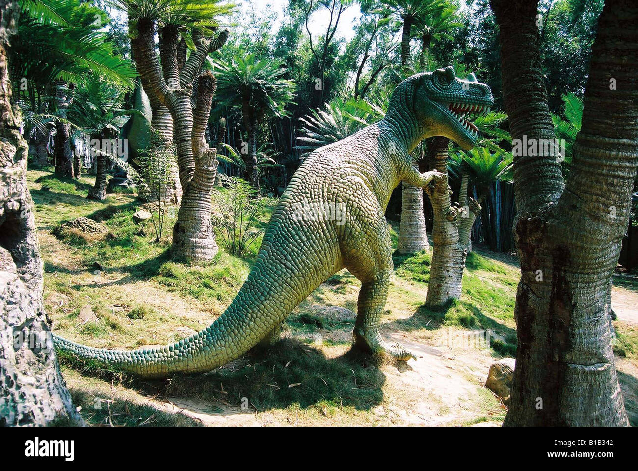 dinosaur in tropical rainforest Stock Photo - Alamy