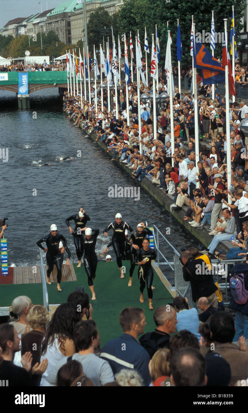 Spectators, swimmers, triathlon at Kleine Alster swimming stretch just ...