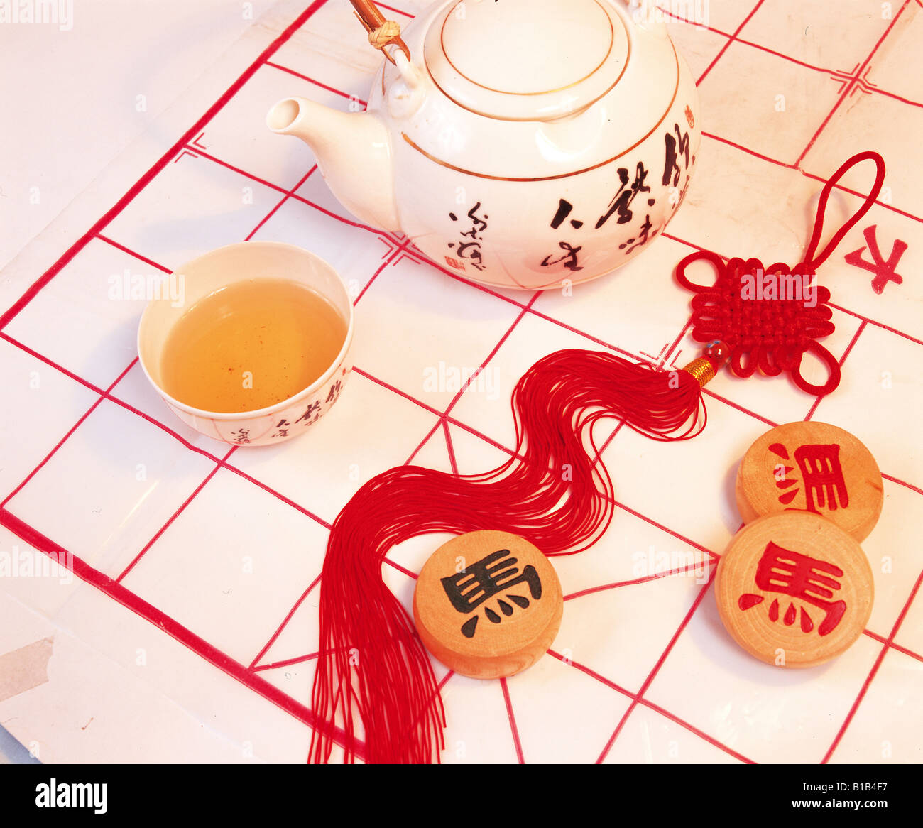 Chinese chess,teapot,cup and Chinese knot Stock Photo - Alamy