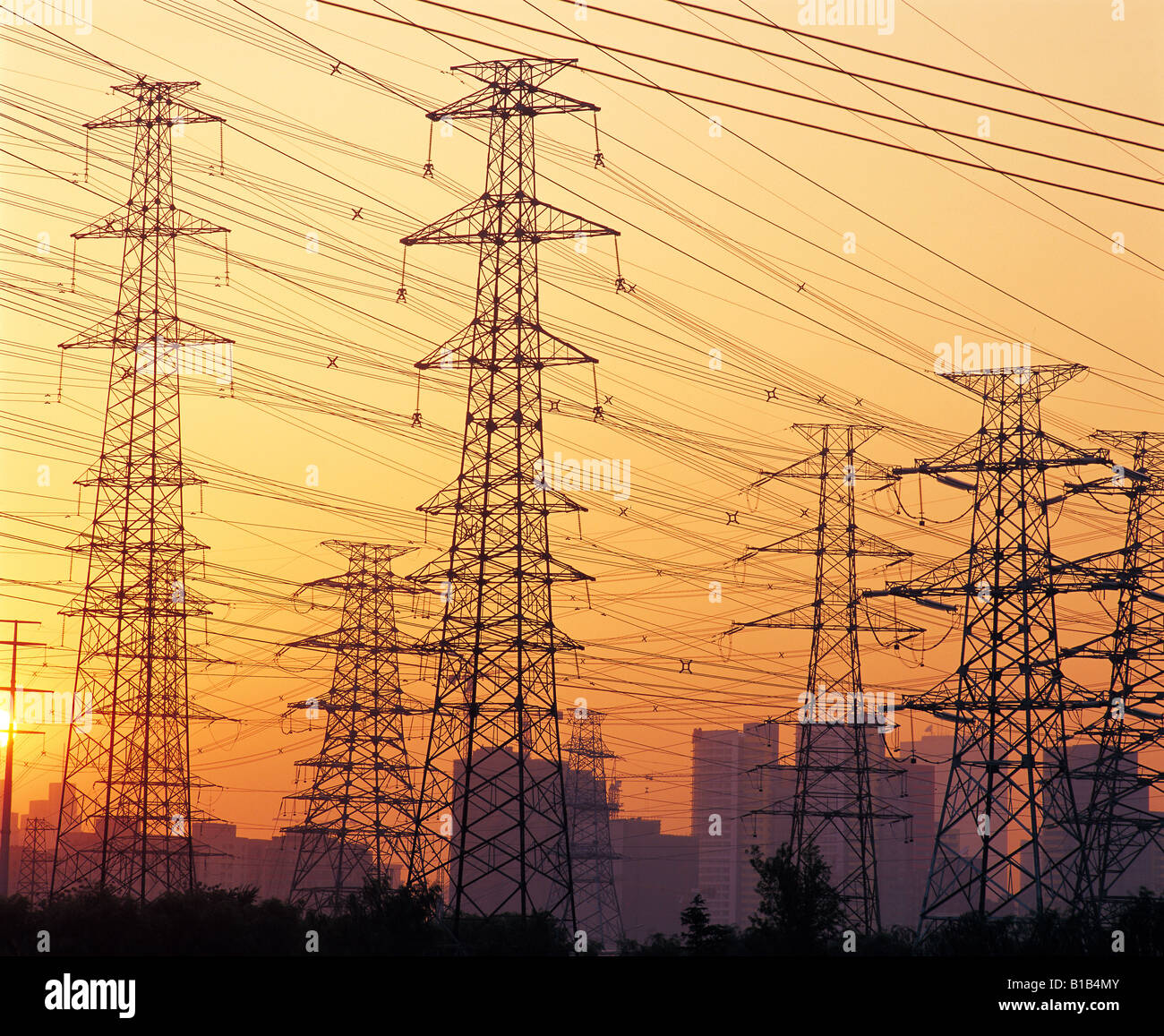 electricity pylon in dusk Stock Photo - Alamy