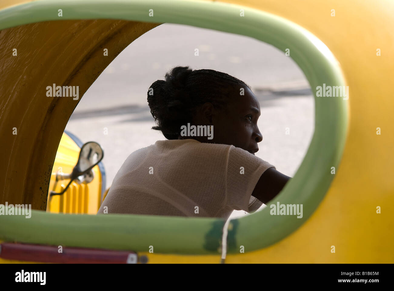 Coco taxi driver in Havana Centro, Parque Central Stock Photo - Alamy