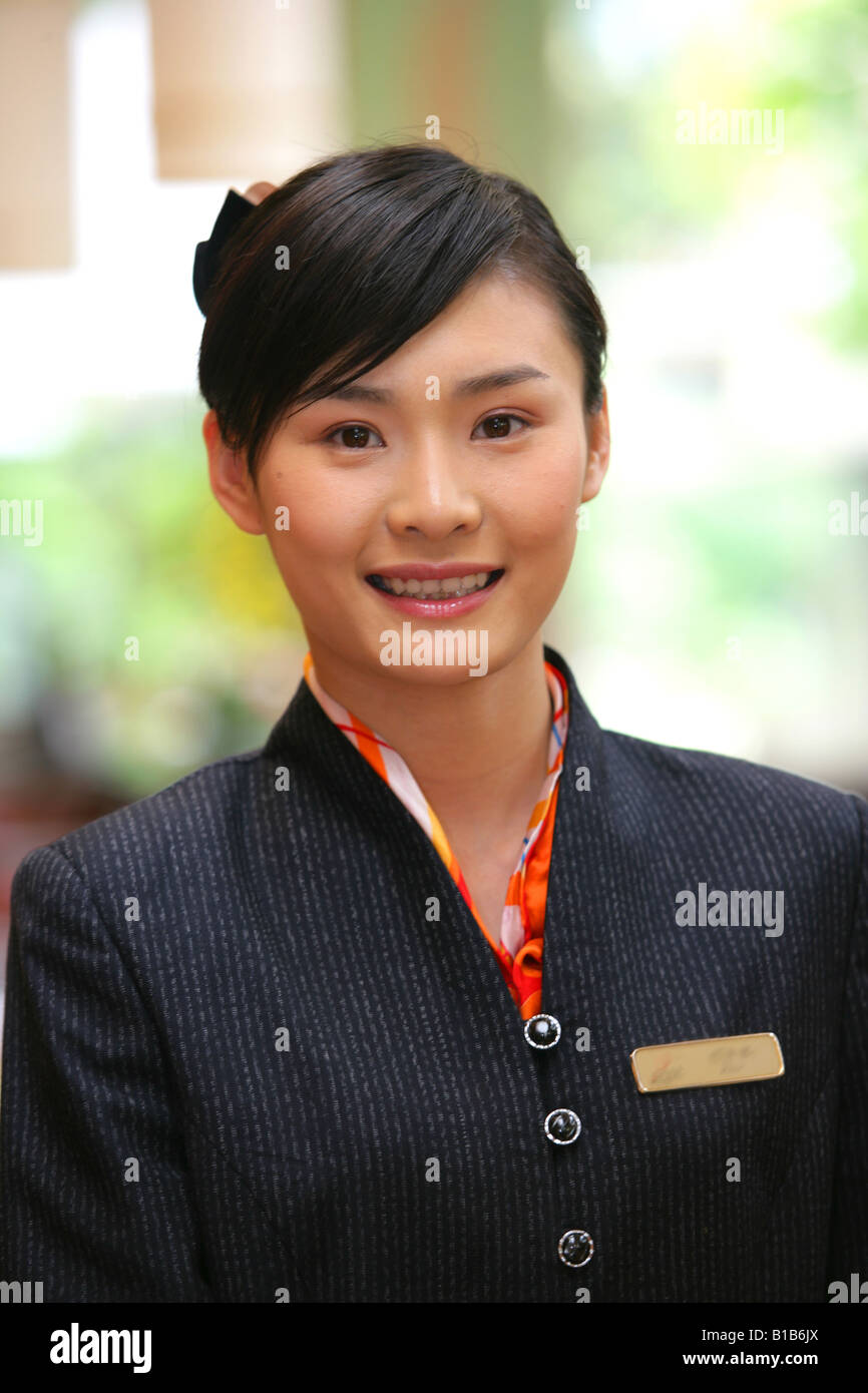 portrait of hotel receptionist Stock Photo - Alamy