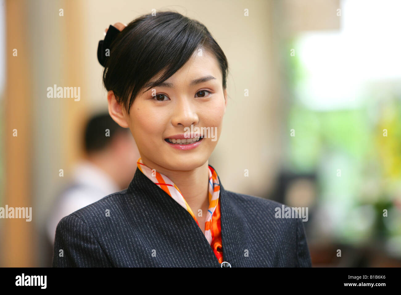 portrait of hotel receptionist Stock Photo - Alamy