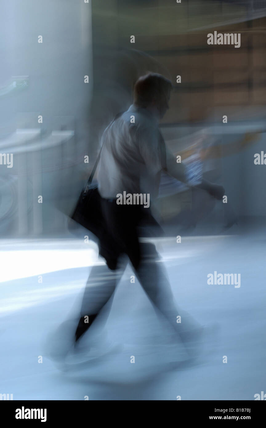 Blurry picture of a walking man Stock Photo - Alamy