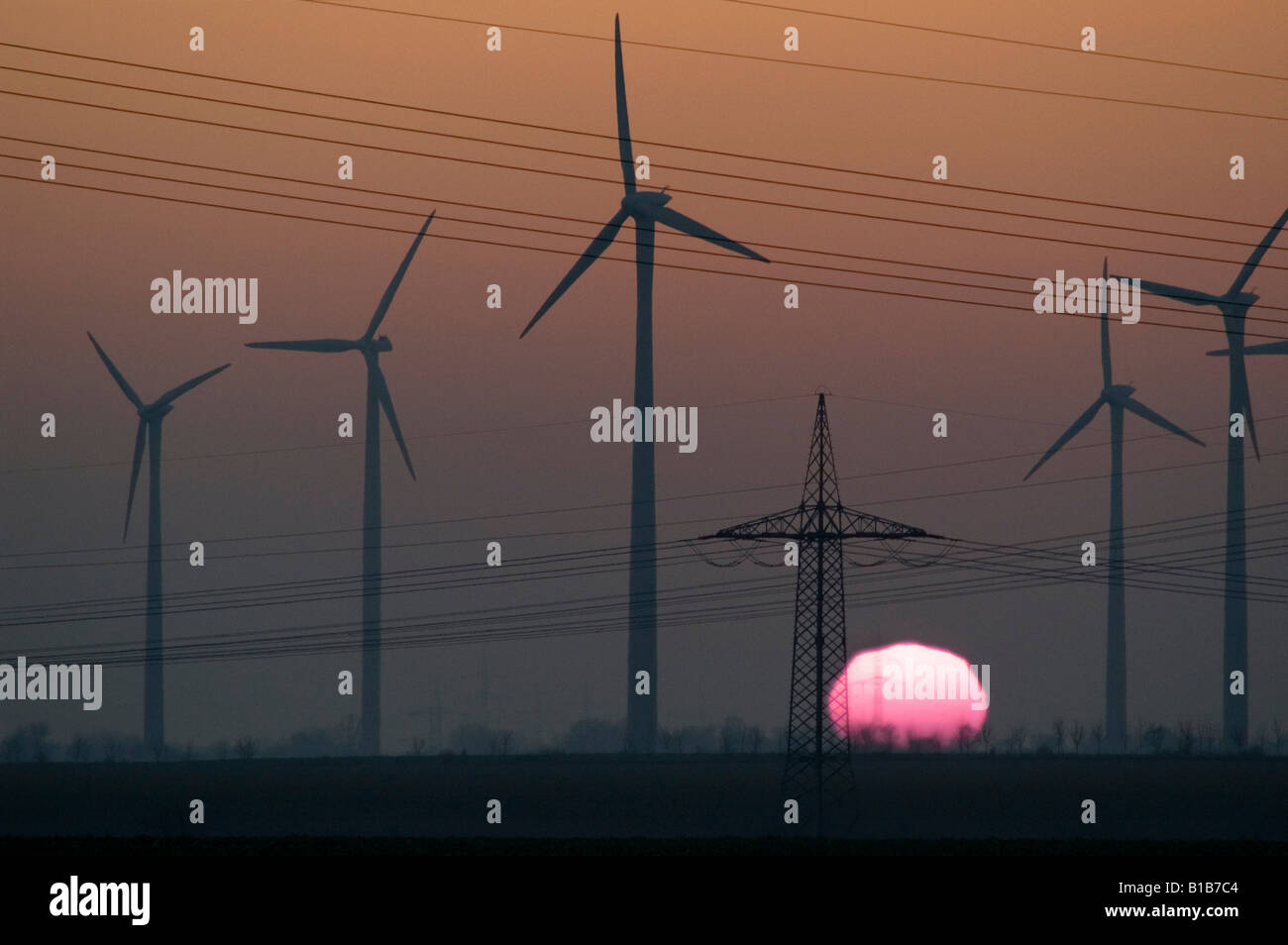 Wind park at sunset, Nauen, Germany Stock Photo - Alamy