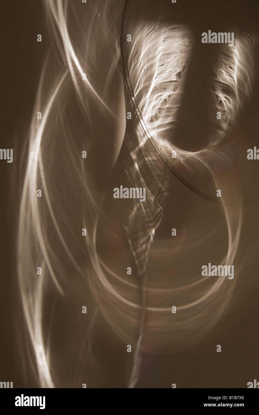 light passed through glass onto textured surface Stock Photo - Alamy