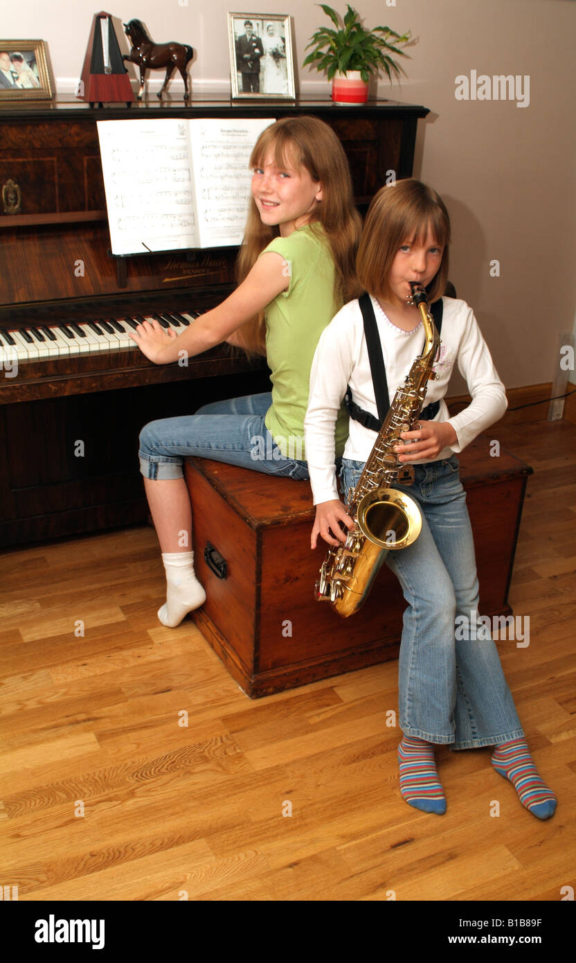 Children playing saxophone hi-res stock photography and images - Alamy